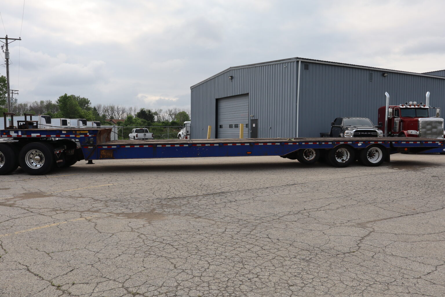 2017 LEDWELL 53′ HYDRATAIL 80K GVW 20K WINCH REMOTE LIFT AXLE 22.5″ WHEELS